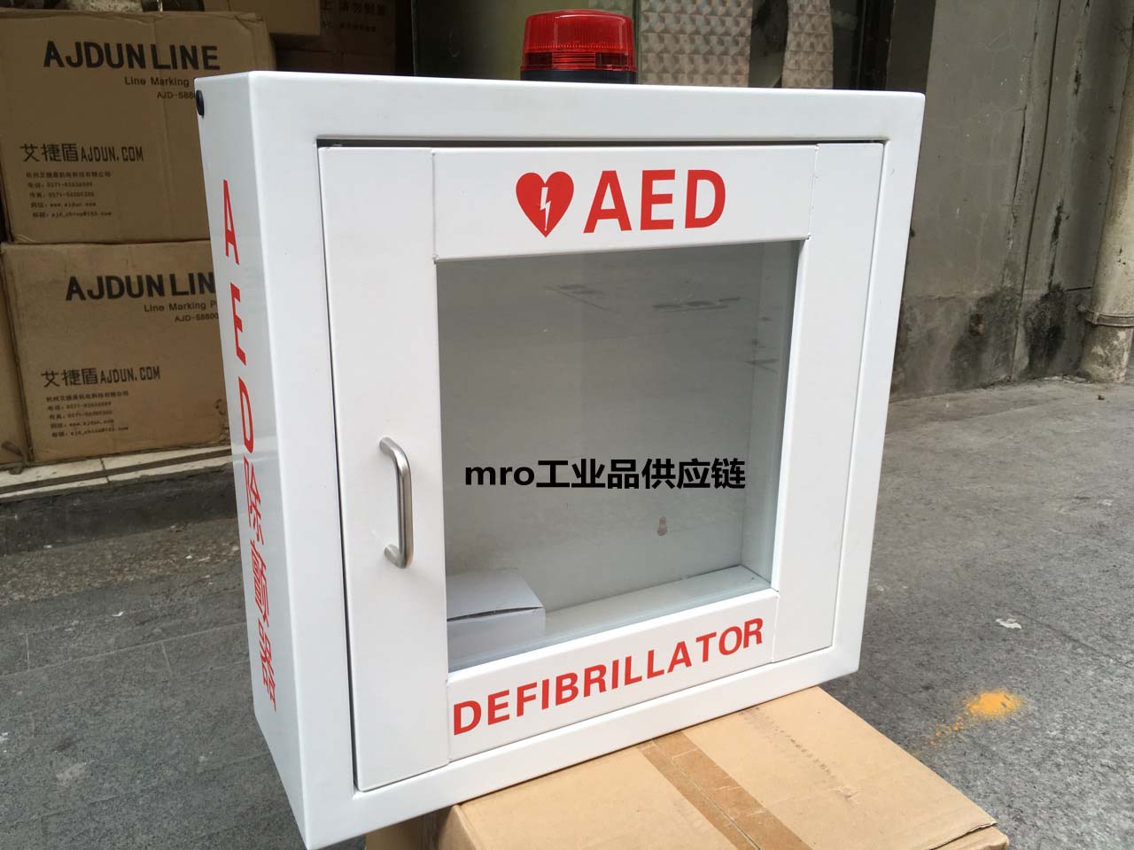 Wall-mounted AED outer box with rechargeable AED defibrillator storage ...