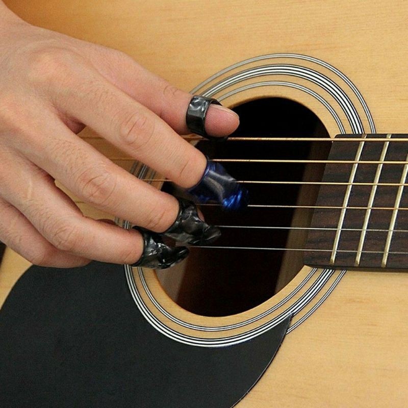 R.A Bookshop 4 pieces Guitar Finger Pick Assorted Color Finger ...